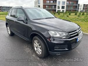 Melns Volkswagen Touareg 2013 Tallina, ar dzinēja tilpumu 3.00 L un nobraukumu 282 tūkst. km par 10999 €, foto 5 vietnē AUTOMOTO.COM.LV