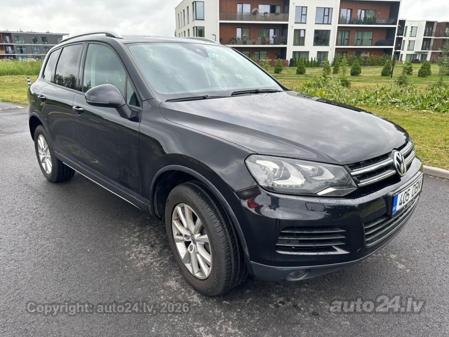 Melns Volkswagen Touareg 2013 Tallina, ar dzinēja tilpumu 3.00 L un nobraukumu 282 tūkst. km par 10999 €, foto 5 vietnē AUTOMOTO.COM.LV