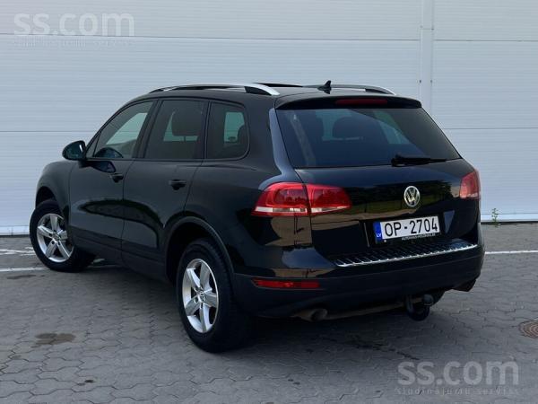 Black Volkswagen Touareg 2013 in Riga, with an engine capacity of 3.00 L and mileage of 0 thousand km for 13000 €, photo 5 on AUTOMOTO.COM.LV