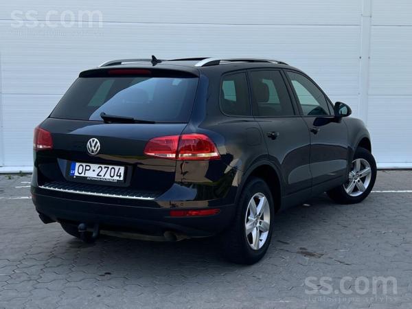 Black Volkswagen Touareg 2013 in Riga, with an engine capacity of 3.00 L and mileage of 0 thousand km for 13000 €, photo 6 on AUTOMOTO.COM.LV