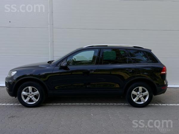 Black Volkswagen Touareg 2013 in Riga, with an engine capacity of 3.00 L and mileage of 0 thousand km for 13000 €, photo 8 on AUTOMOTO.COM.LV