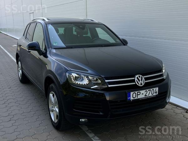 Black Volkswagen Touareg 2013 in Riga, with an engine capacity of 3.00 L and mileage of 0 thousand km for 13000 €, photo 9 on AUTOMOTO.COM.LV