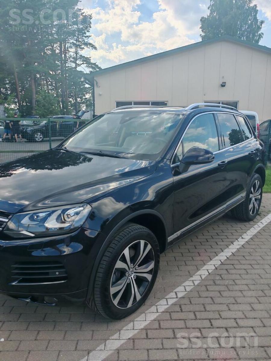 Melns Volkswagen Touareg 2013 Jūrmala, ar dzinēja tilpumu 4.20 L un nobraukumu 486 tūkst. km par 14900 €, foto 1 vietnē AUTOMOTO.COM.LV