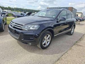 Black Volkswagen Touareg 2013 in Vilnius, with an engine capacity of 3.00 L and mileage of 283 thousand km for 12800 €, photo  on AUTOMOTO.COM.LV