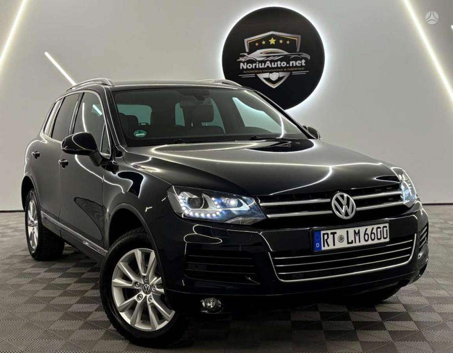 Black Volkswagen Touareg 2013 in Marijampole, with an engine capacity of 2.97 L and mileage of 296 thousand km for 11650 €, photo 1 on AUTOMOTO.COM.LV