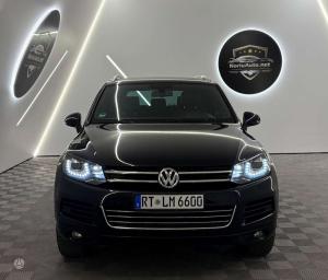 Black Volkswagen Touareg 2013 in Marijampole, with an engine capacity of 2.97 L and mileage of 296 thousand km for 11650 €, photo 6 on AUTOMOTO.COM.LV