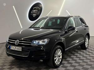 Black Volkswagen Touareg 2013 in Marijampole, with an engine capacity of 2.97 L and mileage of 296 thousand km for 11650 €, photo 8 on AUTOMOTO.COM.LV