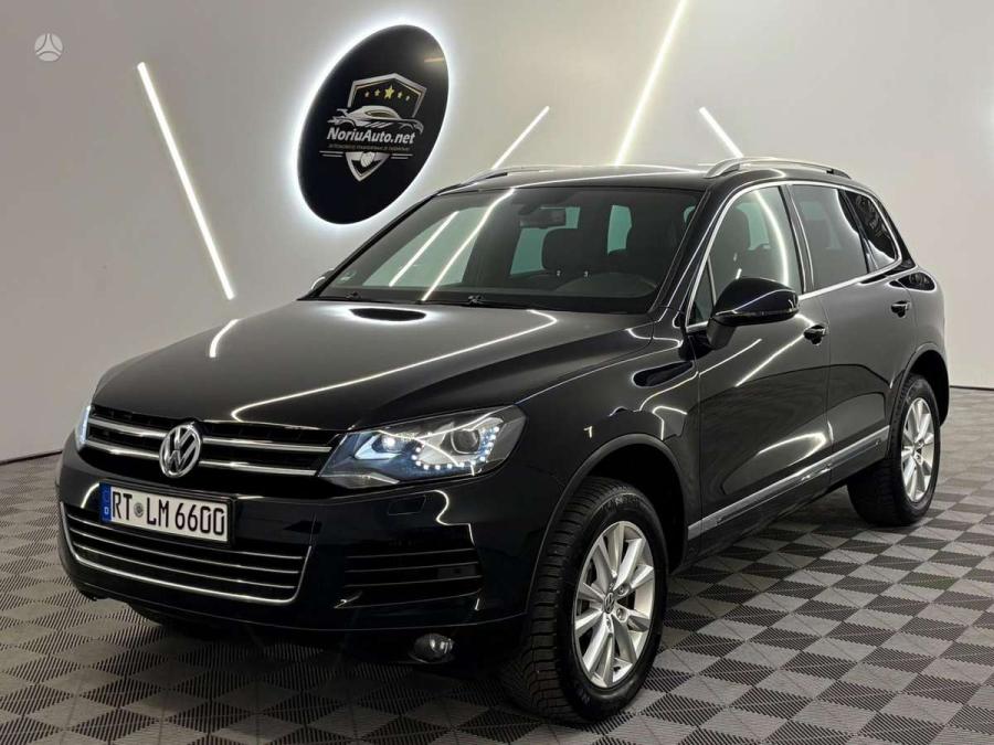 Black Volkswagen Touareg 2013 in Marijampole, with an engine capacity of 2.97 L and mileage of 296 thousand km for 11650 €, photo 8 on AUTOMOTO.COM.LV