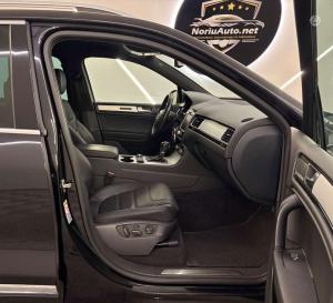 Black Volkswagen Touareg 2013 in Marijampole, with an engine capacity of 2.97 L and mileage of 296 thousand km for 11650 €, photo 16 on AUTOMOTO.COM.LV