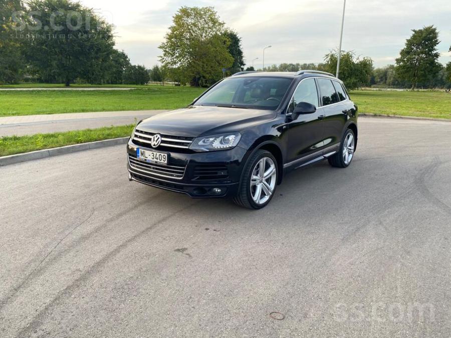 Melns Volkswagen Touareg 2013 Rīga, ar dzinēja tilpumu 3.00 L un nobraukumu 288 tūkst. km par 13700 €, foto 1 vietnē AUTOMOTO.COM.LV