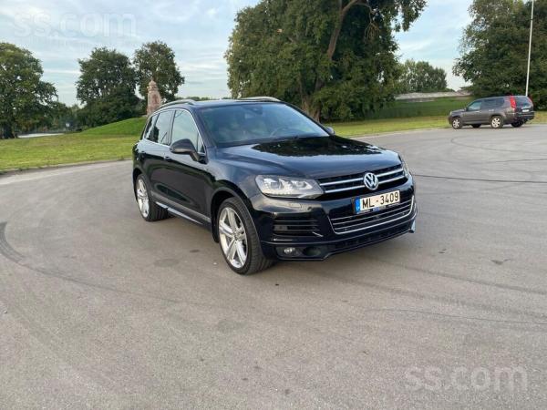 Melns Volkswagen Touareg 2013 Rīga, ar dzinēja tilpumu 3.00 L un nobraukumu 288 tūkst. km par 13700 €, foto 3 vietnē AUTOMOTO.COM.LV
