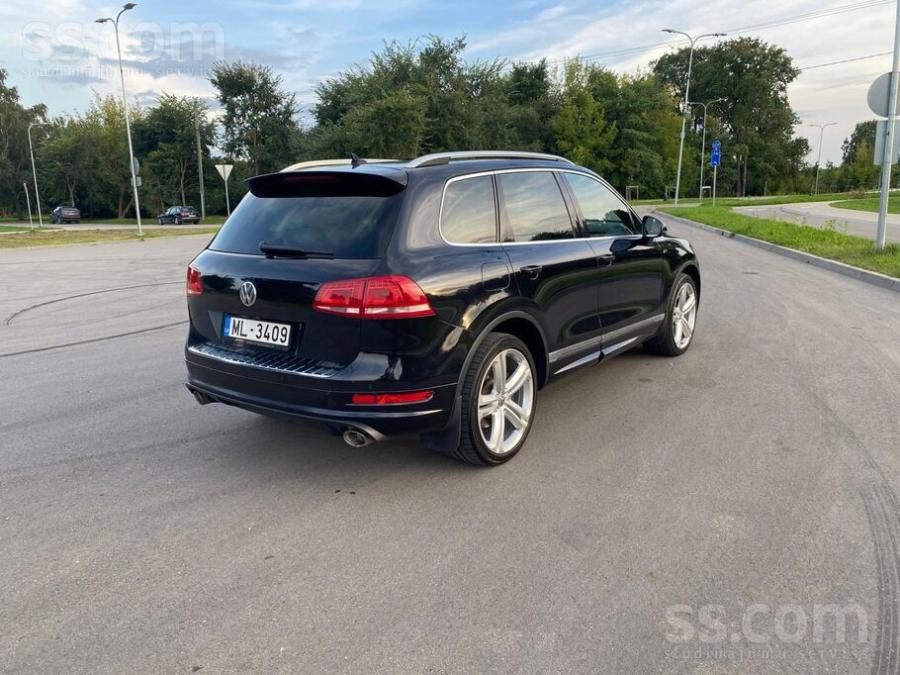 Melns Volkswagen Touareg 2013 Rīga, ar dzinēja tilpumu 3.00 L un nobraukumu 288 tūkst. km par 13700 €, foto 4 vietnē AUTOMOTO.COM.LV