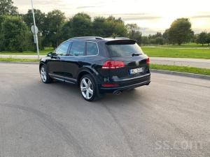 Melns Volkswagen Touareg 2013 Rīga, ar dzinēja tilpumu 3.00 L un nobraukumu 288 tūkst. km par 13700 €, foto 5 vietnē AUTOMOTO.COM.LV
