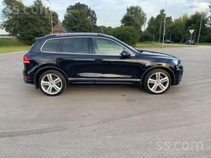 Melns Volkswagen Touareg 2013 Rīga, ar dzinēja tilpumu 3.00 L un nobraukumu 288 tūkst. km par 13700 €, foto 6 vietnē AUTOMOTO.COM.LV