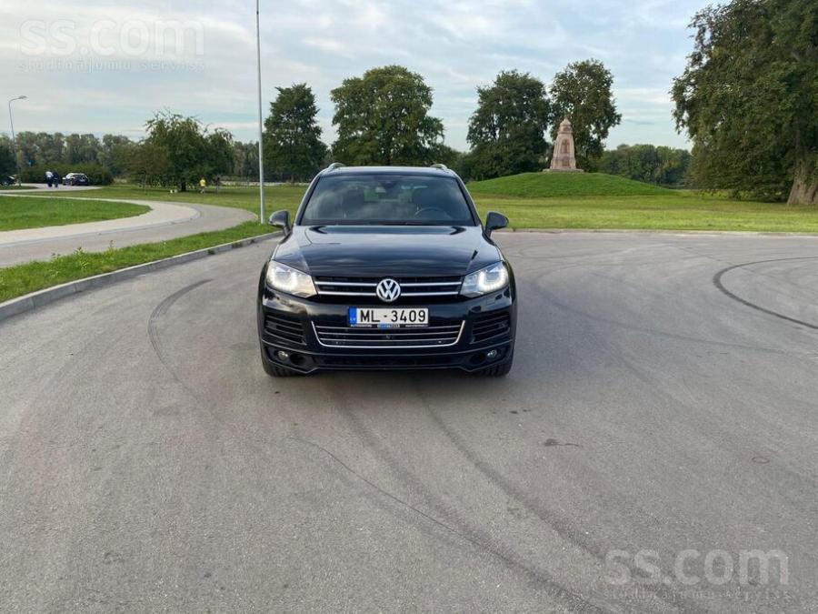 Melns Volkswagen Touareg 2013 Rīga, ar dzinēja tilpumu 3.00 L un nobraukumu 288 tūkst. km par 13700 €, foto 8 vietnē AUTOMOTO.COM.LV