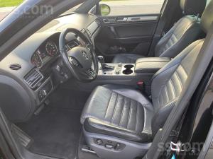 Melns Volkswagen Touareg 2013 Rīga, ar dzinēja tilpumu 3.00 L un nobraukumu 288 tūkst. km par 13700 €, foto 13 vietnē AUTOMOTO.COM.LV