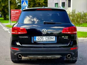 Melns Volkswagen Touareg 2013 Tallina, ar dzinēja tilpumu 3.00 L un nobraukumu 285 tūkst. km par 8990 €, foto 6 vietnē AUTOMOTO.COM.LV
