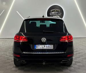 Black Volkswagen Touareg 2013 in Marijampole, with an engine capacity of 2.97 L and mileage of 296 thousand km for 11350 €, photo 9 on AUTOMOTO.COM.LV