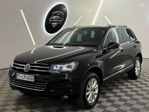 Black Volkswagen Touareg 2013 in Marijampole, with an engine capacity of 2.97 L and mileage of 296 thousand km for 11350 €, photo 14 on AUTOMOTO.COM.LV
