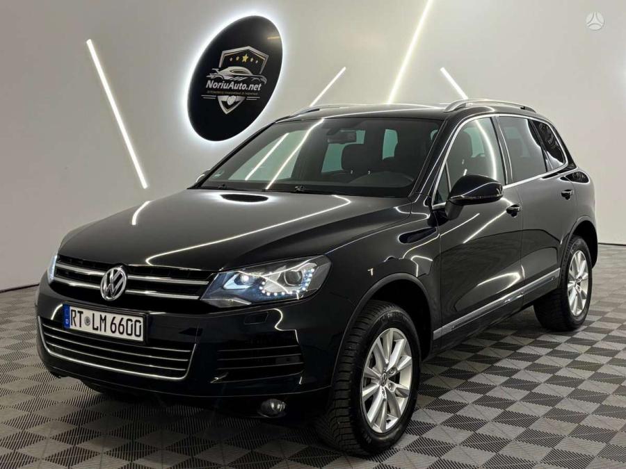 Black Volkswagen Touareg 2013 in Marijampole, with an engine capacity of 2.97 L and mileage of 296 thousand km for 11350 €, photo 14 on AUTOMOTO.COM.LV