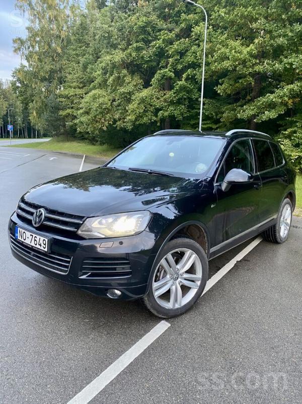 Black Volkswagen Touareg 2013 in Aluksne, with an engine capacity of 3.00 L and mileage of 415 thousand km for 9100 €, photo 3 on AUTOMOTO.COM.LV