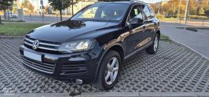Black Volkswagen Touareg 2013 in Vilnius, with an engine capacity of 3.00 L and mileage of 283 thousand km for 11950 €, photo  on AUTOMOTO.COM.LV