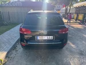 Melns Volkswagen Touareg 2014 Rīga, ar dzinēja tilpumu 3.00 L un nobraukumu 243 tūkst. km par 13000 €, foto 2 vietnē AUTOMOTO.COM.LV