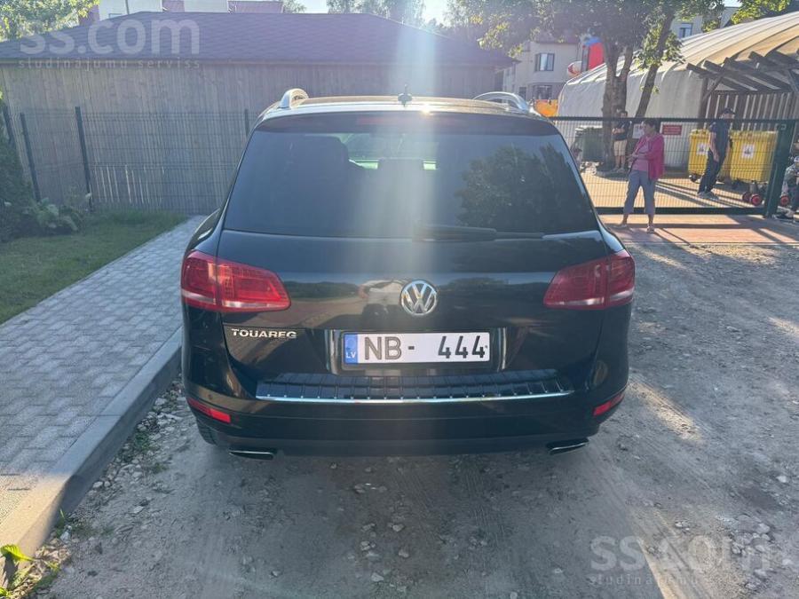Melns Volkswagen Touareg 2014 Rīga, ar dzinēja tilpumu 3.00 L un nobraukumu 243 tūkst. km par 13000 €, foto 2 vietnē AUTOMOTO.COM.LV