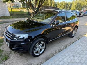 Melns Volkswagen Touareg 2014 Rīga, ar dzinēja tilpumu 3.00 L un nobraukumu 243 tūkst. km par 13000 €, foto 4 vietnē AUTOMOTO.COM.LV