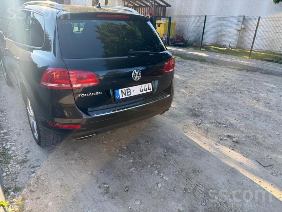Melns Volkswagen Touareg 2014 Rīga, ar dzinēja tilpumu 3.00 L un nobraukumu 243 tūkst. km par 13000 €, foto 5 vietnē AUTOMOTO.COM.LV