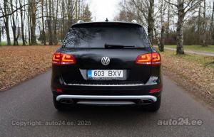 Black Volkswagen Touareg 2014 in Tartu, with an engine capacity of 3.00 L and mileage of 284 thousand km for 10999 €, photo 2 on AUTOMOTO.COM.LV