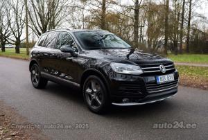 Black Volkswagen Touareg 2014 in Tartu, with an engine capacity of 3.00 L and mileage of 284 thousand km for 10999 €, photo 3 on AUTOMOTO.COM.LV