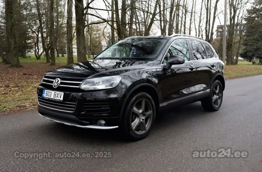 Black Volkswagen Touareg 2014 in Tartu, with an engine capacity of 3.00 L and mileage of 284 thousand km for 10999 €, photo 4 on AUTOMOTO.COM.LV
