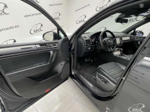 Black Volkswagen Touareg 2014 in Vilnius, with an engine capacity of 4.13 L and mileage of 270 thousand km for 14800 €, photo 23 on AUTOMOTO.COM.LV