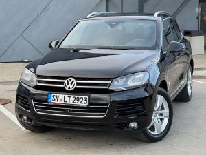 Black Volkswagen Touareg 2014 in Jonava, with an engine capacity of 3.00 L and mileage of 282 thousand km for 13499 €, photo 2 on AUTOMOTO.COM.LV