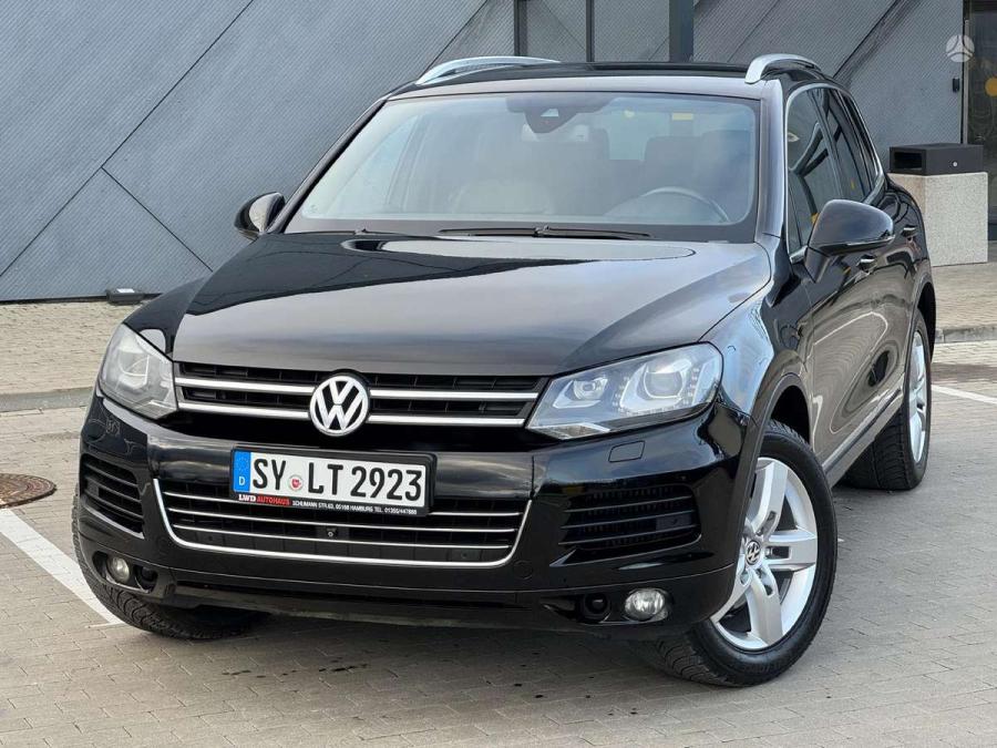 Black Volkswagen Touareg 2014 in Jonava, with an engine capacity of 3.00 L and mileage of 282 thousand km for 13499 €, photo 2 on AUTOMOTO.COM.LV