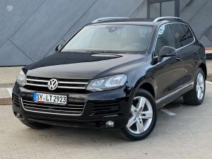 Black Volkswagen Touareg 2014 in Jonava, with an engine capacity of 3.00 L and mileage of 282 thousand km for 13499 €, photo 3 on AUTOMOTO.COM.LV