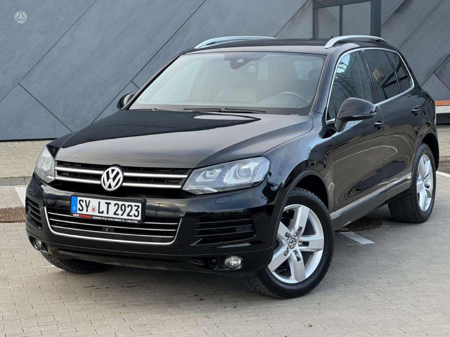 Black Volkswagen Touareg 2014 in Jonava, with an engine capacity of 3.00 L and mileage of 282 thousand km for 13499 €, photo 3 on AUTOMOTO.COM.LV