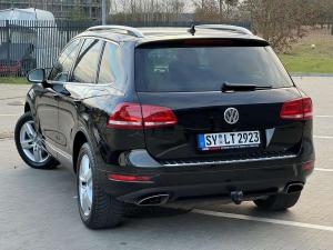 Black Volkswagen Touareg 2014 in Jonava, with an engine capacity of 3.00 L and mileage of 282 thousand km for 13499 €, photo 7 on AUTOMOTO.COM.LV
