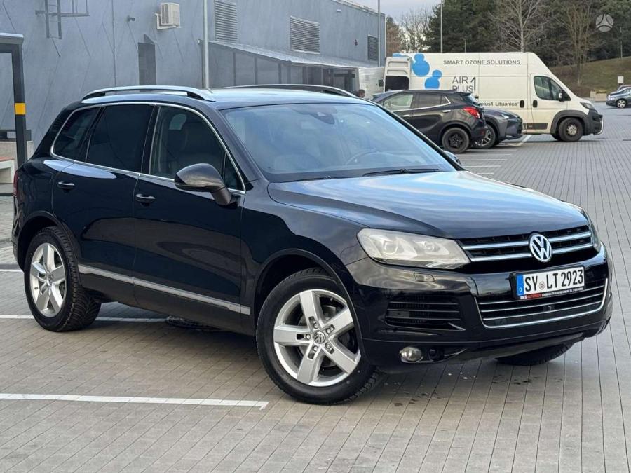 Black Volkswagen Touareg 2014 in Jonava, with an engine capacity of 3.00 L and mileage of 282 thousand km for 13499 €, photo 11 on AUTOMOTO.COM.LV