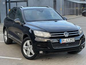Black Volkswagen Touareg 2014 in Jonava, with an engine capacity of 3.00 L and mileage of 282 thousand km for 13499 €, photo 12 on AUTOMOTO.COM.LV