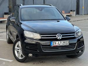 Black Volkswagen Touareg 2014 in Jonava, with an engine capacity of 3.00 L and mileage of 282 thousand km for 13499 €, photo 13 on AUTOMOTO.COM.LV