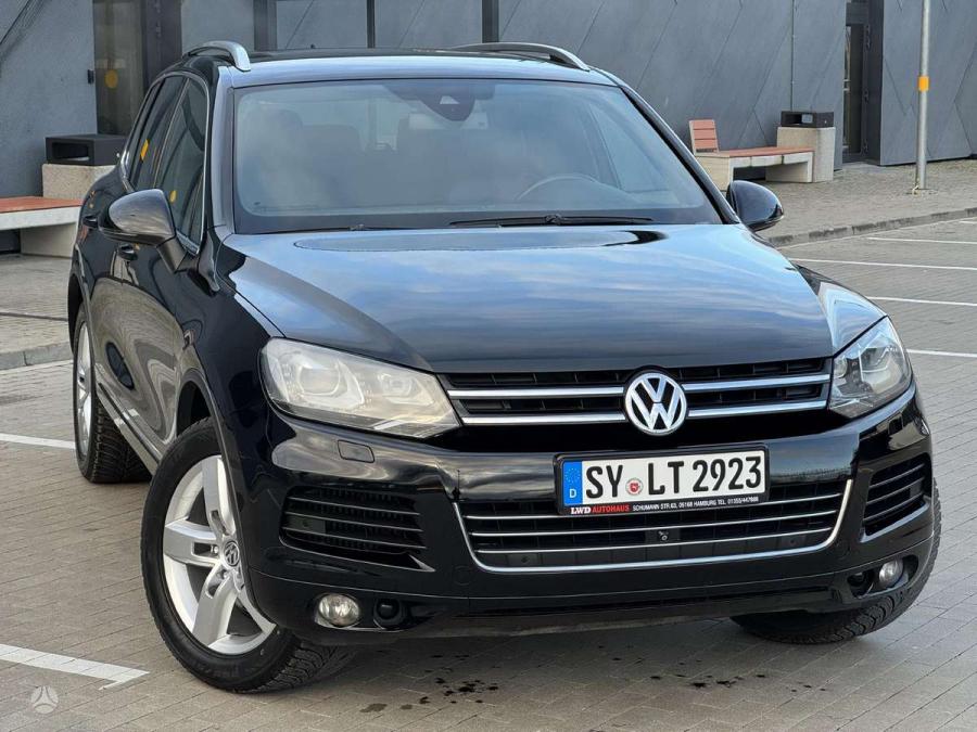 Black Volkswagen Touareg 2014 in Jonava, with an engine capacity of 3.00 L and mileage of 282 thousand km for 13499 €, photo 13 on AUTOMOTO.COM.LV