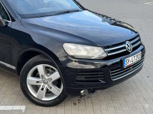 Black Volkswagen Touareg 2014 in Jonava, with an engine capacity of 3.00 L and mileage of 282 thousand km for 13499 €, photo 14 on AUTOMOTO.COM.LV