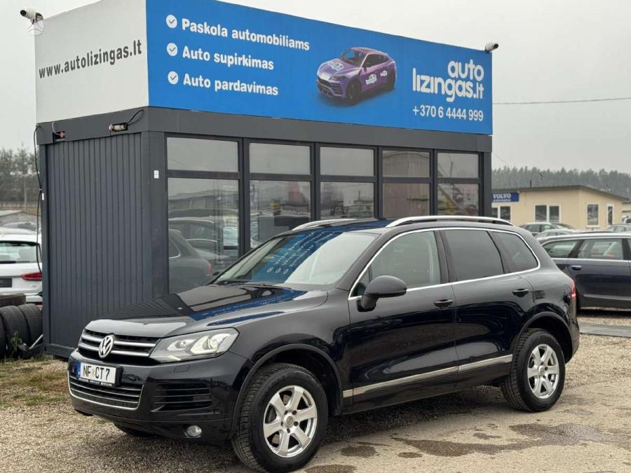 Black Volkswagen Touareg 2014 in Vilnius, with an engine capacity of 3.00 L and mileage of 206 thousand km for 12750 €, photo 1 on AUTOMOTO.COM.LV