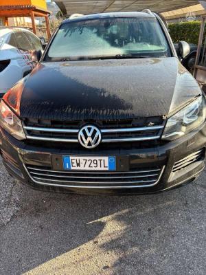 Black Volkswagen Touareg 2014 in Kaunas, with an engine capacity of 2.97 L and mileage of 202 thousand km for 8800 €, photo 3 on AUTOMOTO.COM.LV