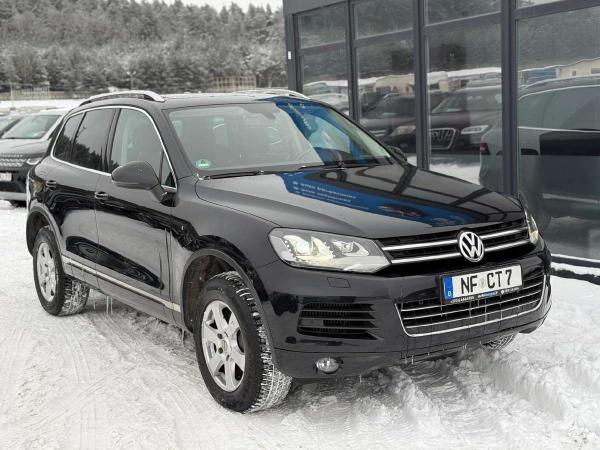 Black Volkswagen Touareg 2014 in Vilnius, with an engine capacity of 3.00 L and mileage of 206 thousand km for 12450 €, photo 2 on AUTOMOTO.COM.LV
