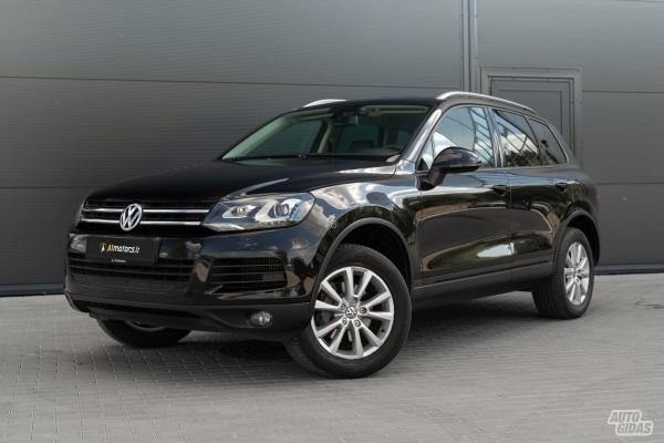 Black Volkswagen Touareg 2014 in Vilnius, with an engine capacity of 0.00 L and mileage of 305 thousand km for 12900 €, photo 1 on AUTOMOTO.COM.LV