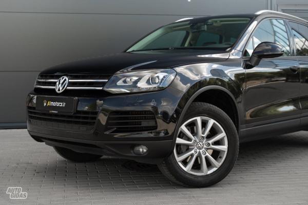 Black Volkswagen Touareg 2014 in Vilnius, with an engine capacity of 0.00 L and mileage of 305 thousand km for 12900 €, photo 2 on AUTOMOTO.COM.LV
