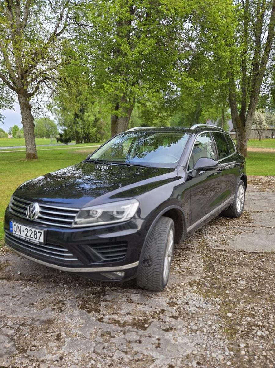 Melns Volkswagen Touareg 2014 Limbaži, ar dzinēja tilpumu 3.00 L un nobraukumu 235 tūkst. km par 13200 €, foto 1 vietnē AUTOMOTO.COM.LV